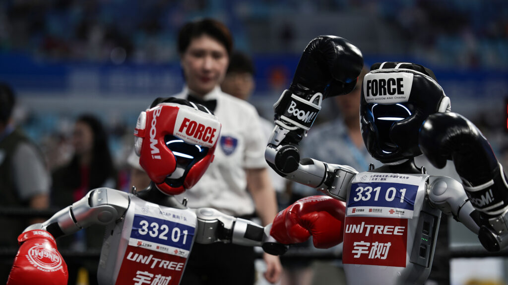 Humanoid robots smash each other's circuits at inaugural Beijing ...
